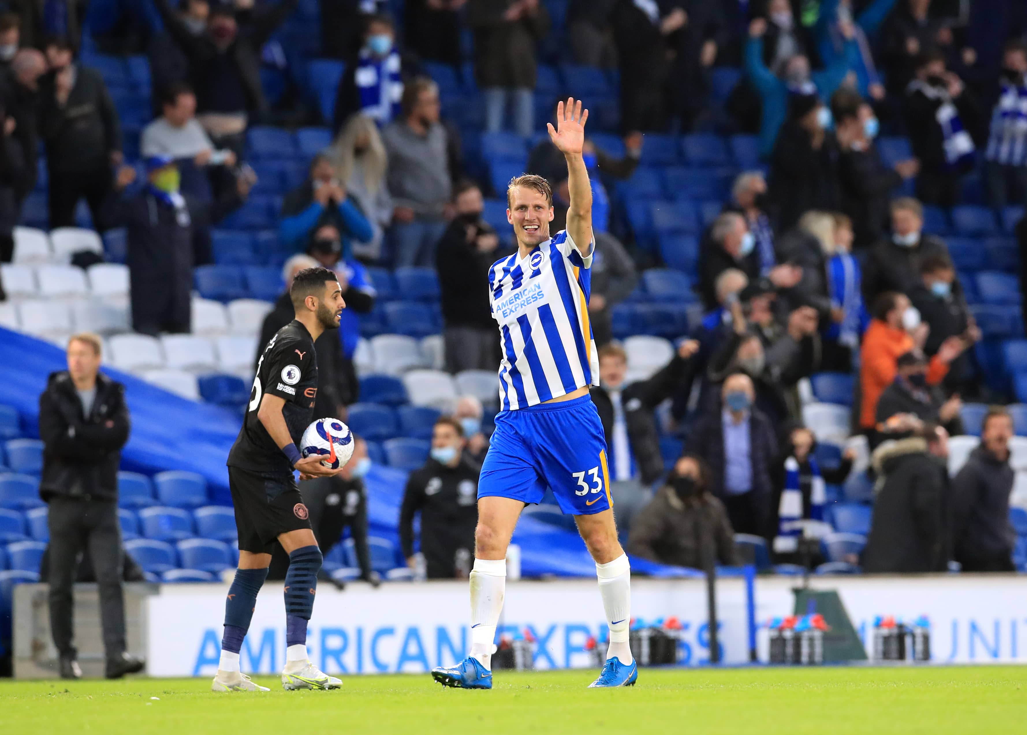 Burn strike completes comeback as Brighton down 10-man Man City